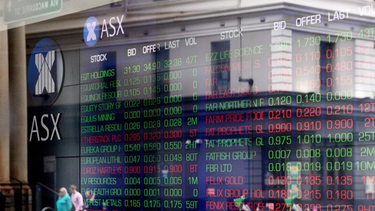 Australian shares edge lower on thin order books